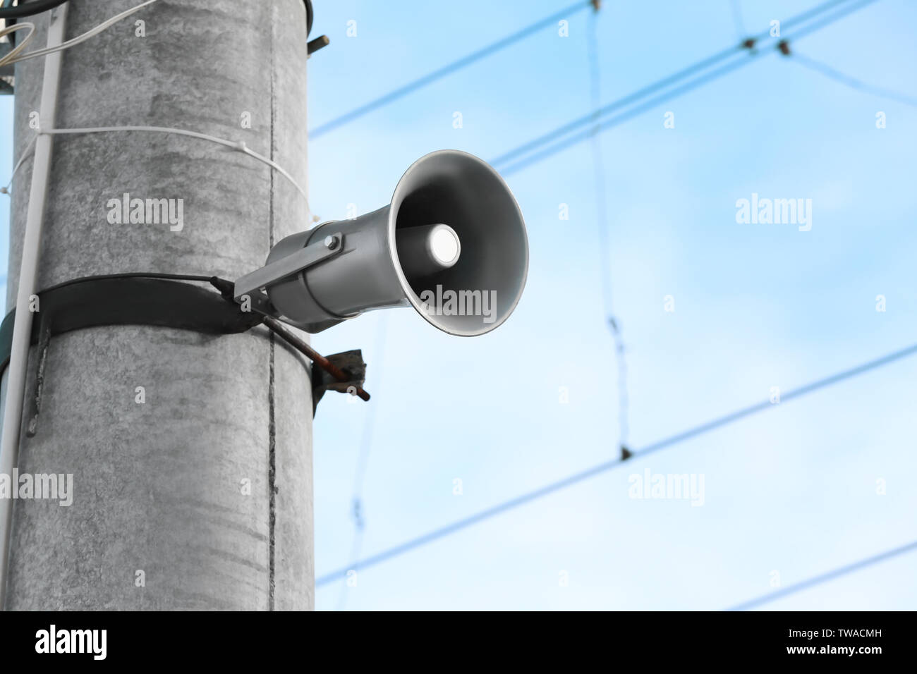 Megaphone on pole outdoors Stock Photo - Alamy