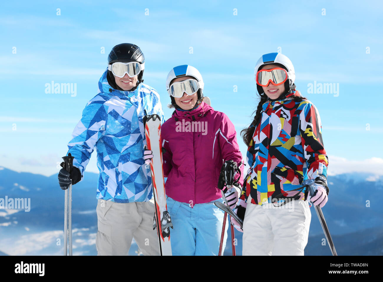Friends on ski piste at resort. Winter vacation Stock Photo - Alamy