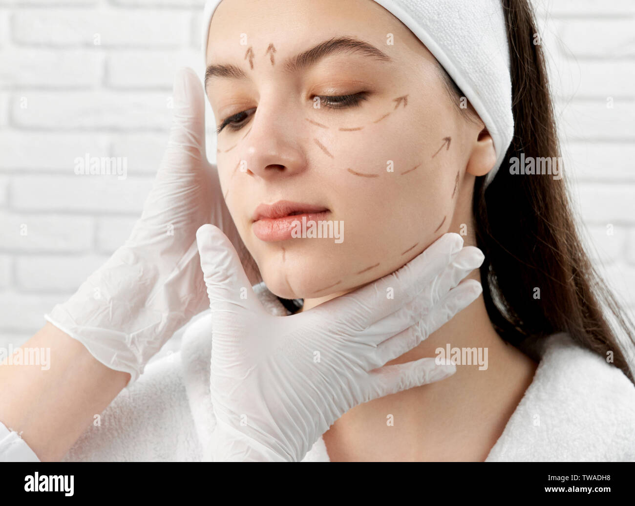 Closeup of attractive woman sitting in beauty salon before lifting ...