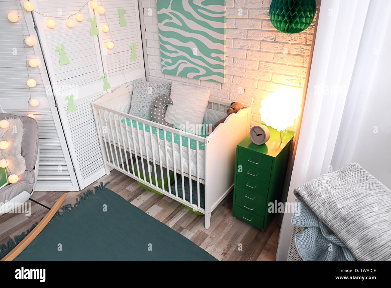 Interior of beautiful modern children's room with crib Stock Photo - Alamy