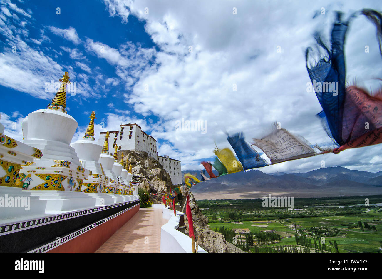 Prayer flags and Chorten or Stupas at Thiksey Monastery, Ladakh, India ...