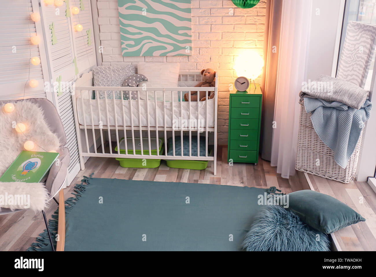Interior of beautiful modern children's room with crib Stock Photo - Alamy