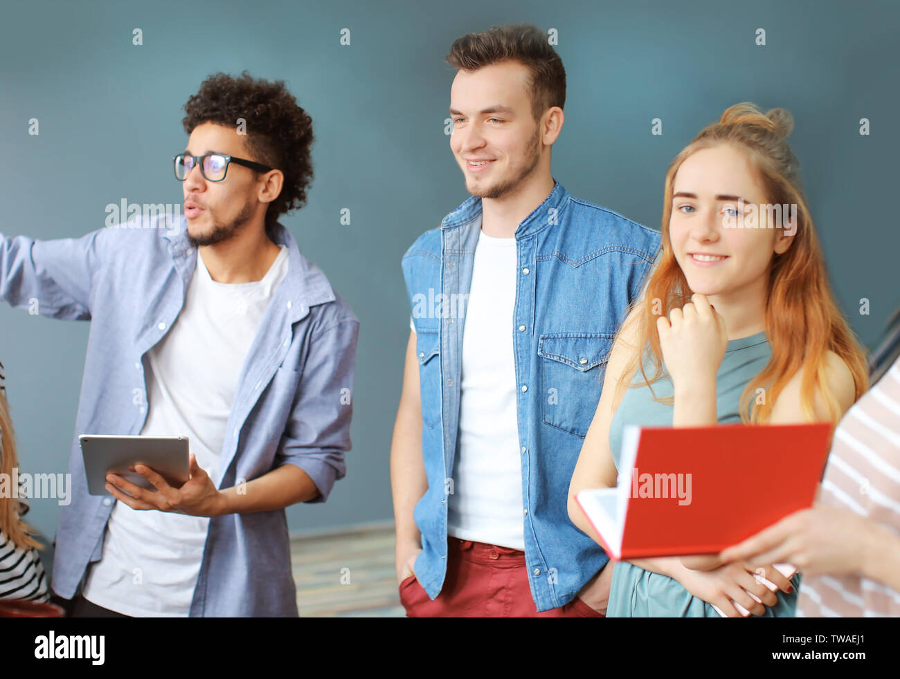 Students resting together in campus building Stock Photo - Alamy