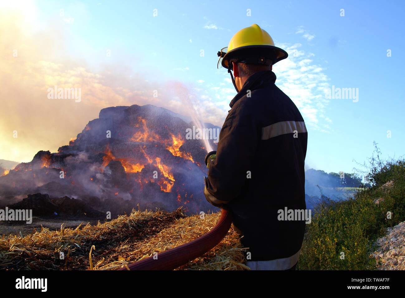 Firefighting hose team hi-res stock photography and images - Alamy