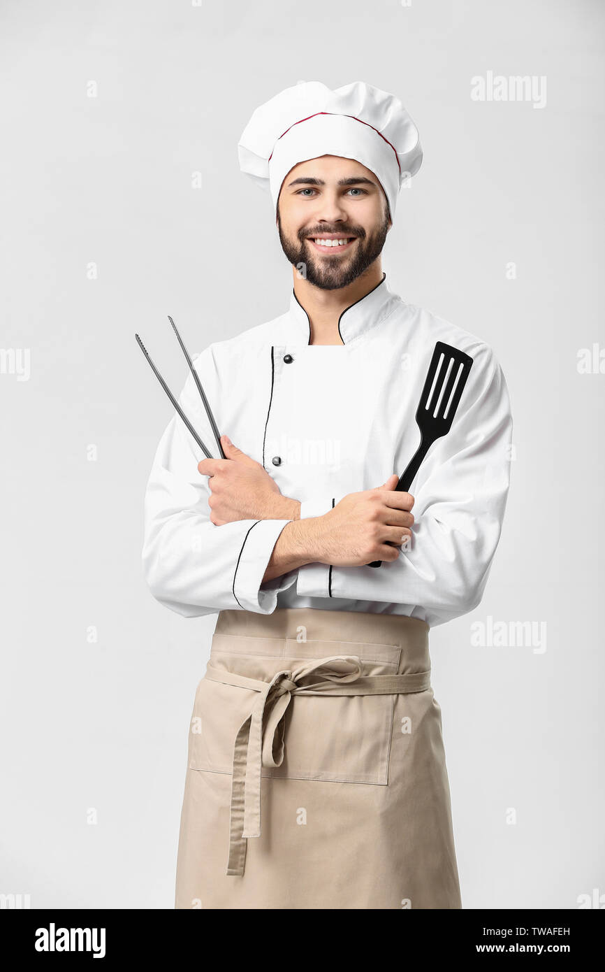 Handsome male chef on white background Stock Photo - Alamy