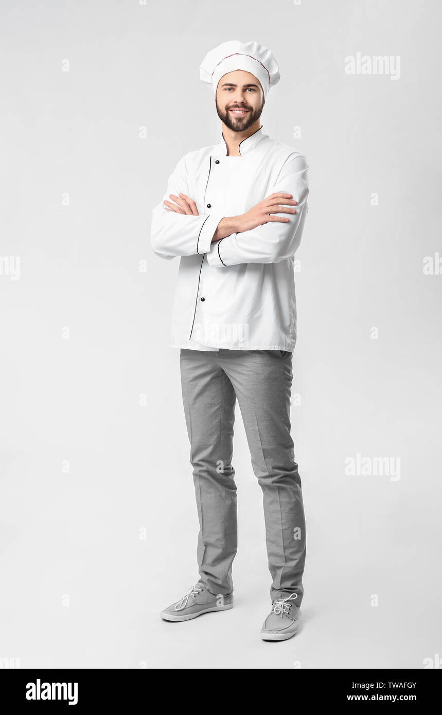 Handsome male chef on white background Stock Photo - Alamy