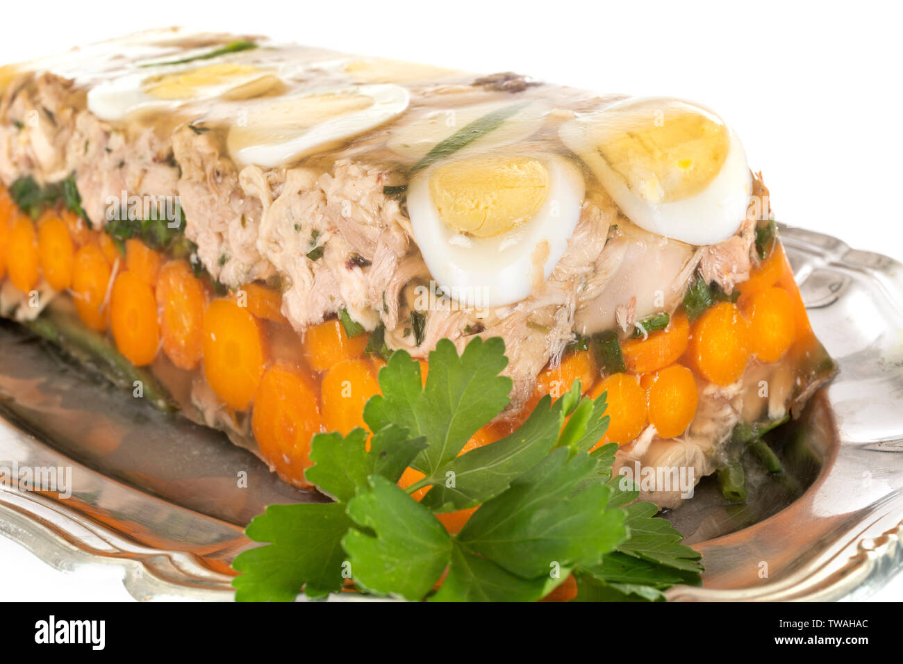 chicken terrine in front of white background Stock Photo - Alamy