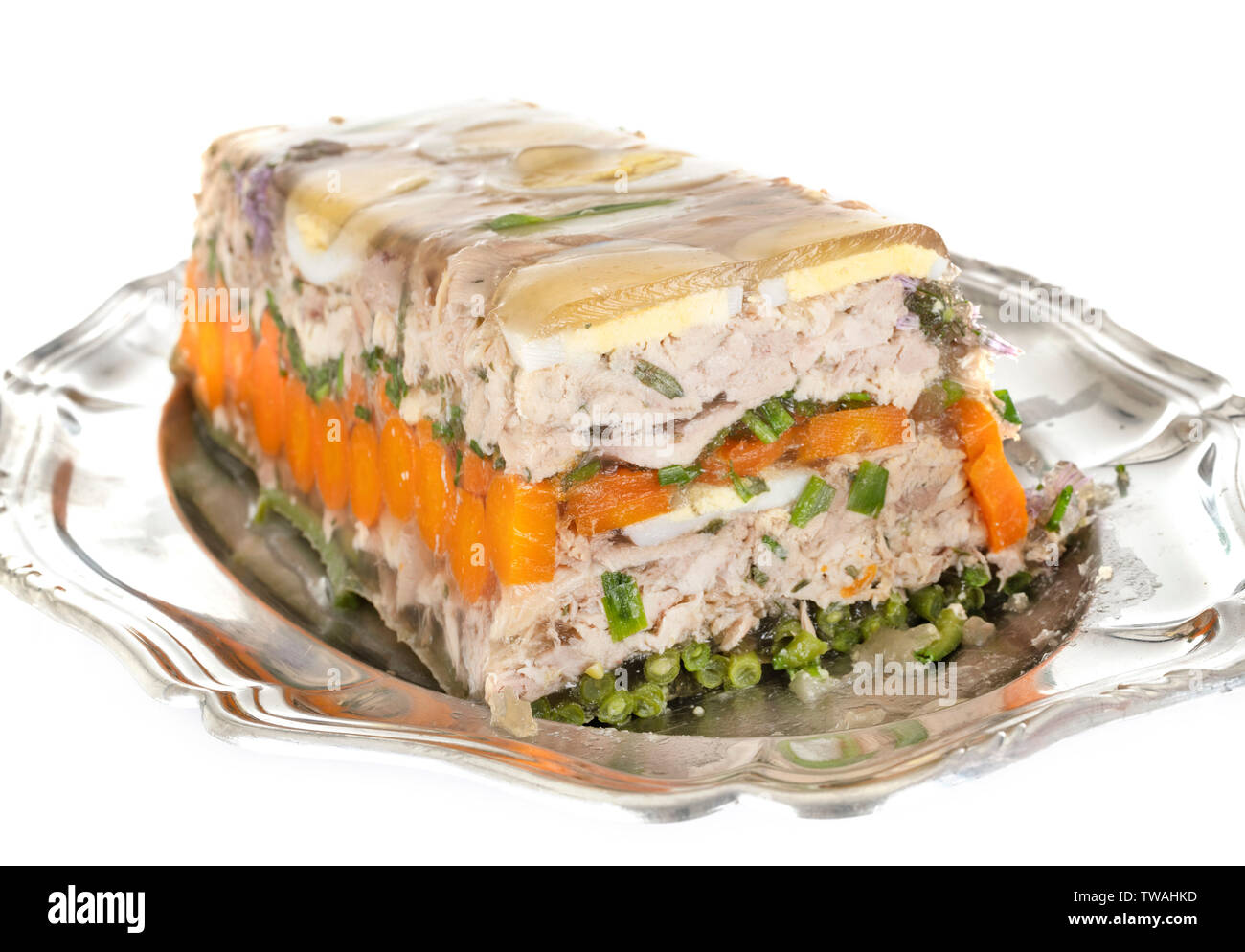 chicken terrine in front of white background Stock Photo - Alamy