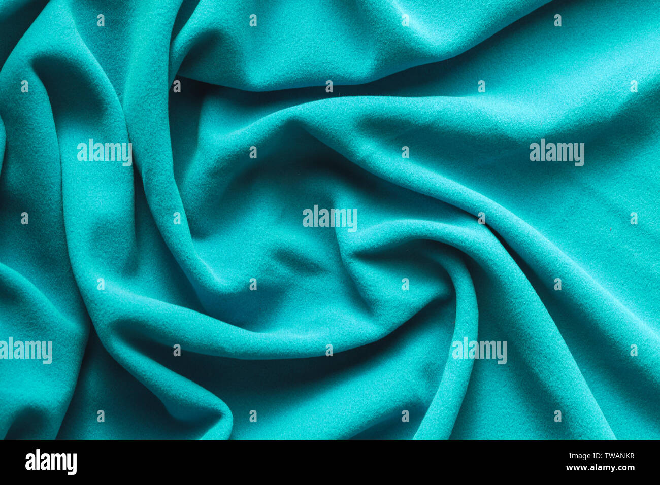 Background texture of cyan fleece, soft napped insulating fabric made ...