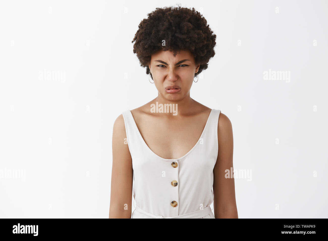 Disgust face african hi-res stock photography and images - Alamy