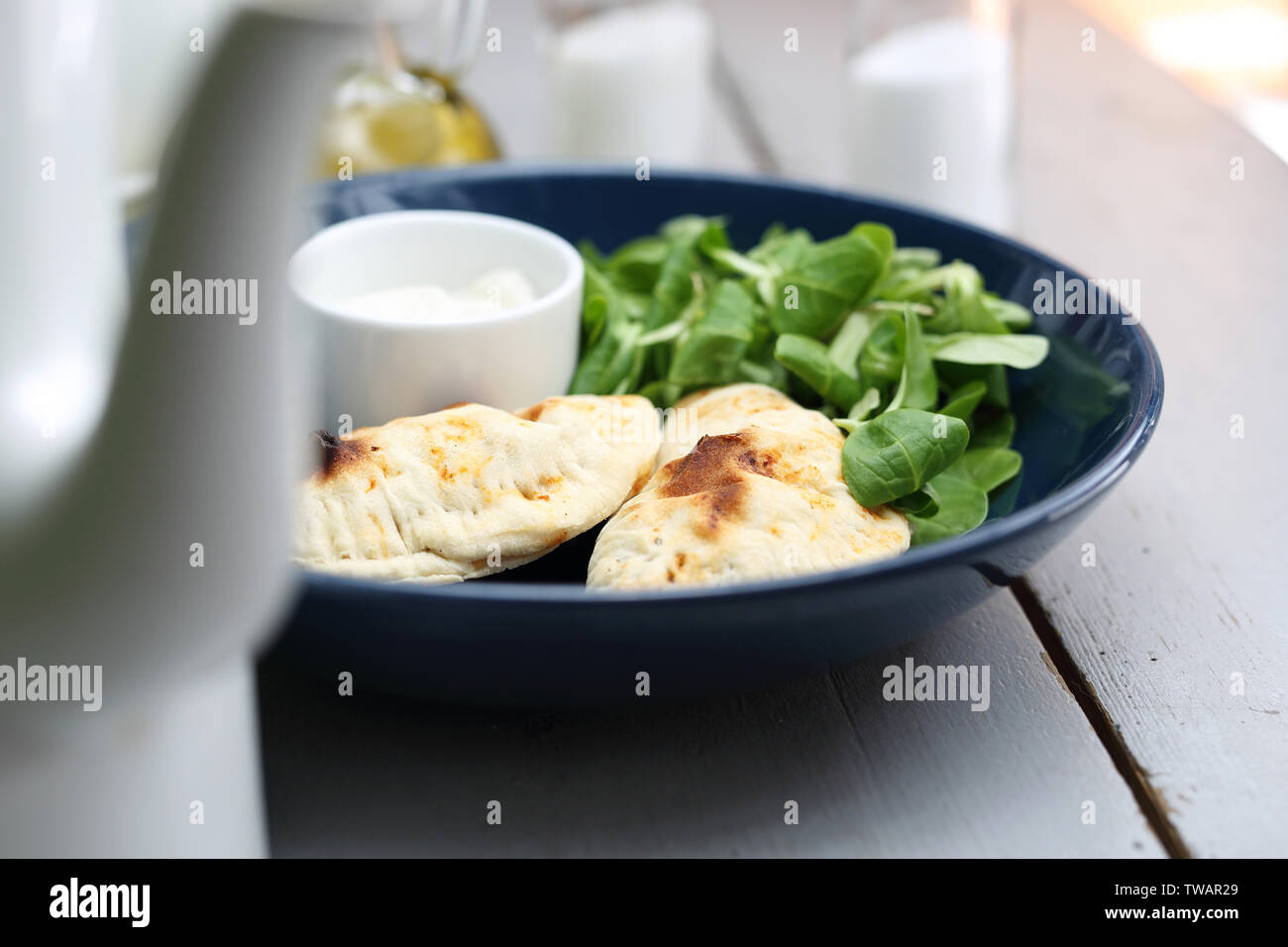 Vegetarian cooking. Dish on a dark plate. Horizontal composition Stock ...