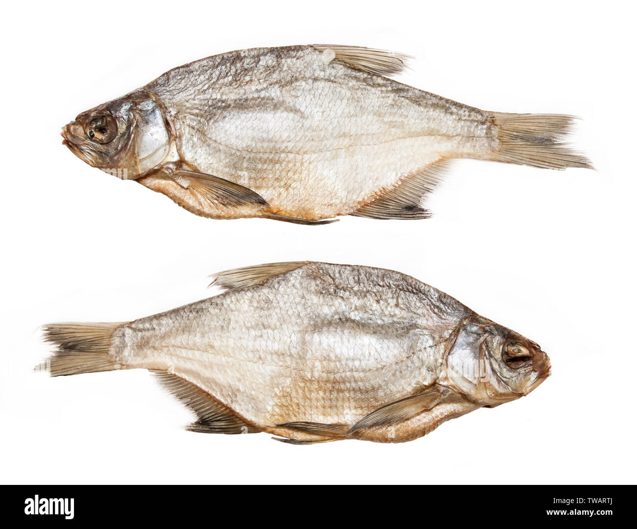 Dried salted bream on a white background Stock Photo - Alamy
