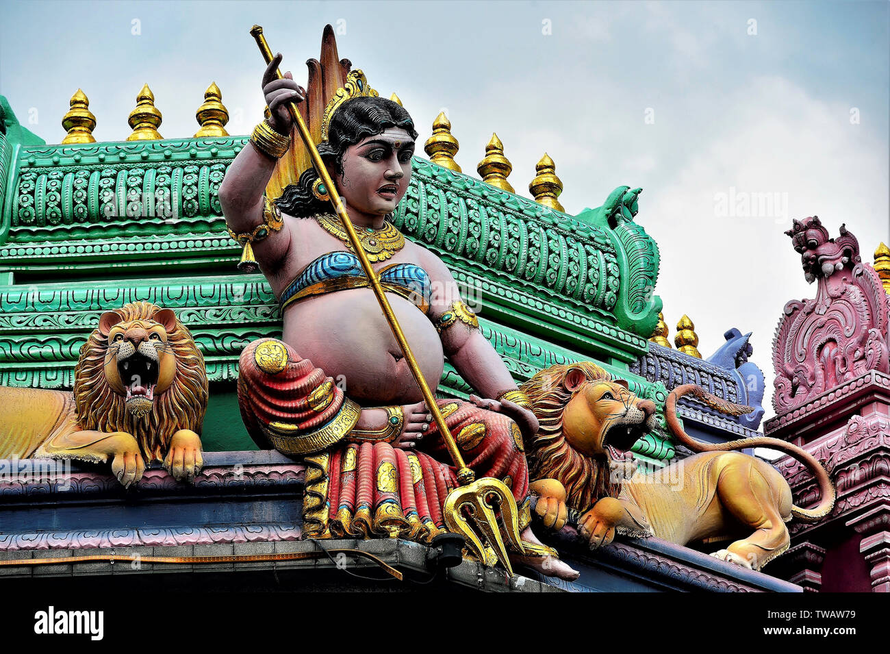 Colourful statues of Hindu religious deities adorning the entrance of ...