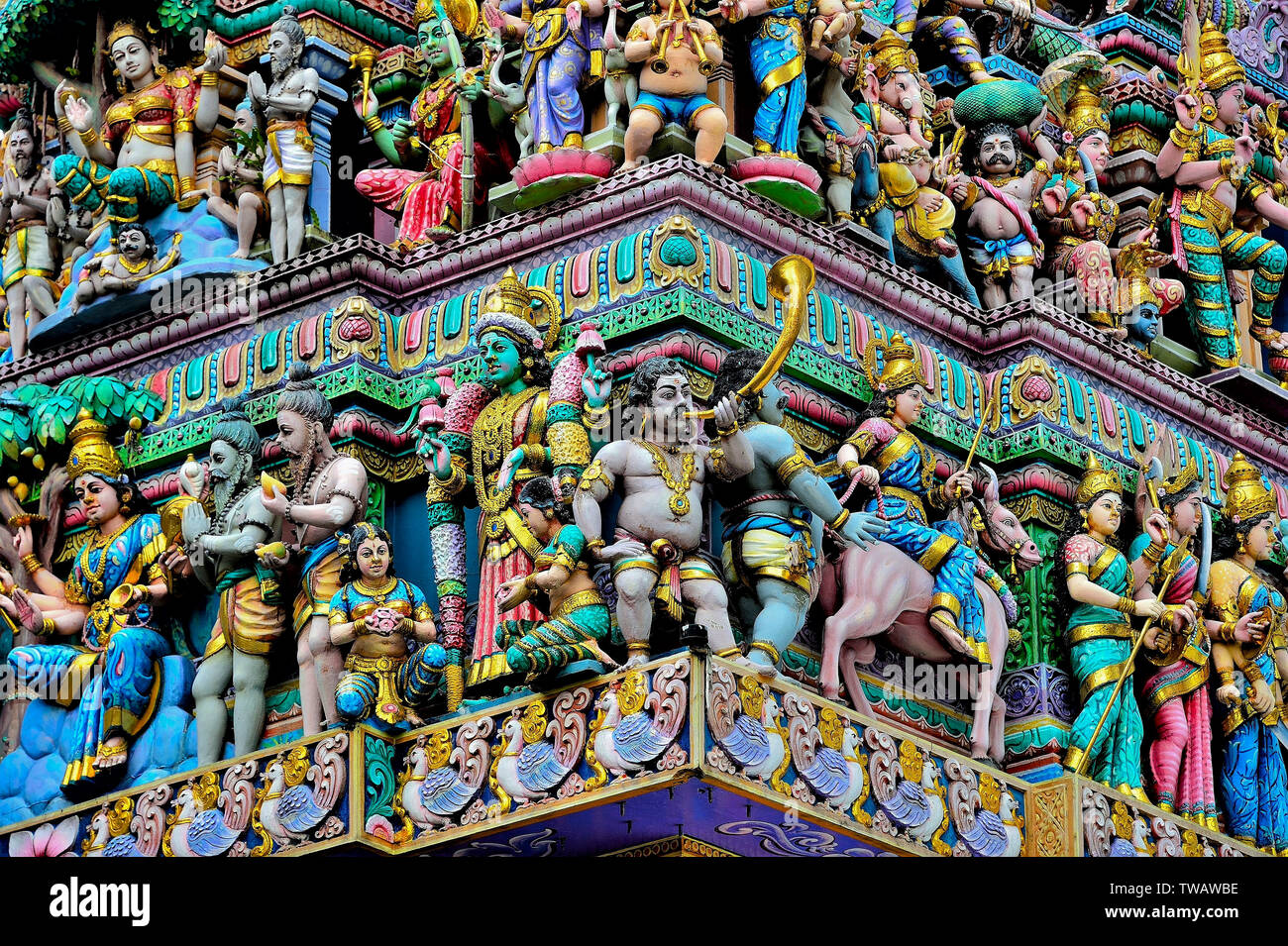 Colourful statues of Hindu religious deities adorning the entrance of ...