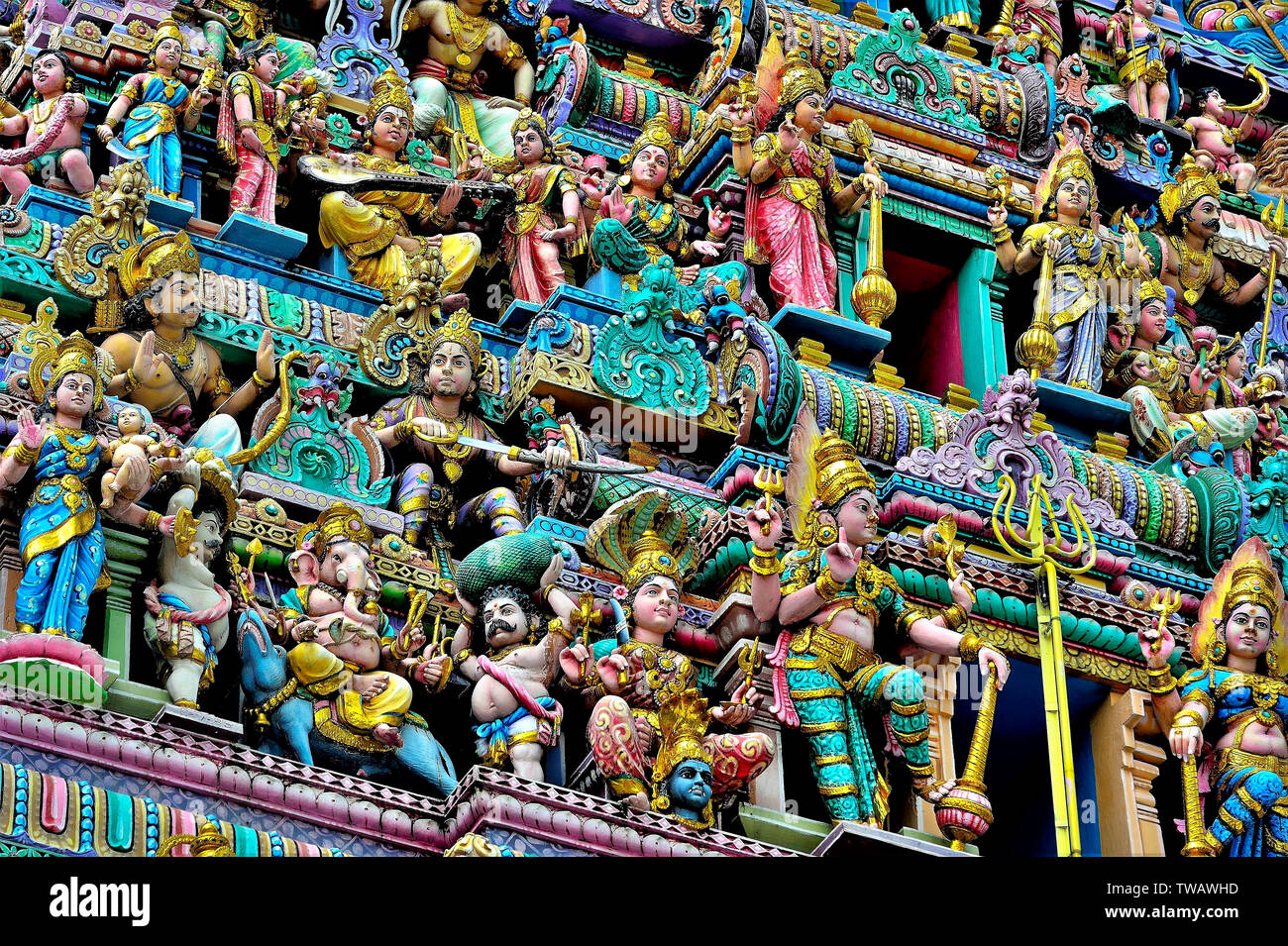 Colourful statues of Hindu religious deities adorning the entrance of ...