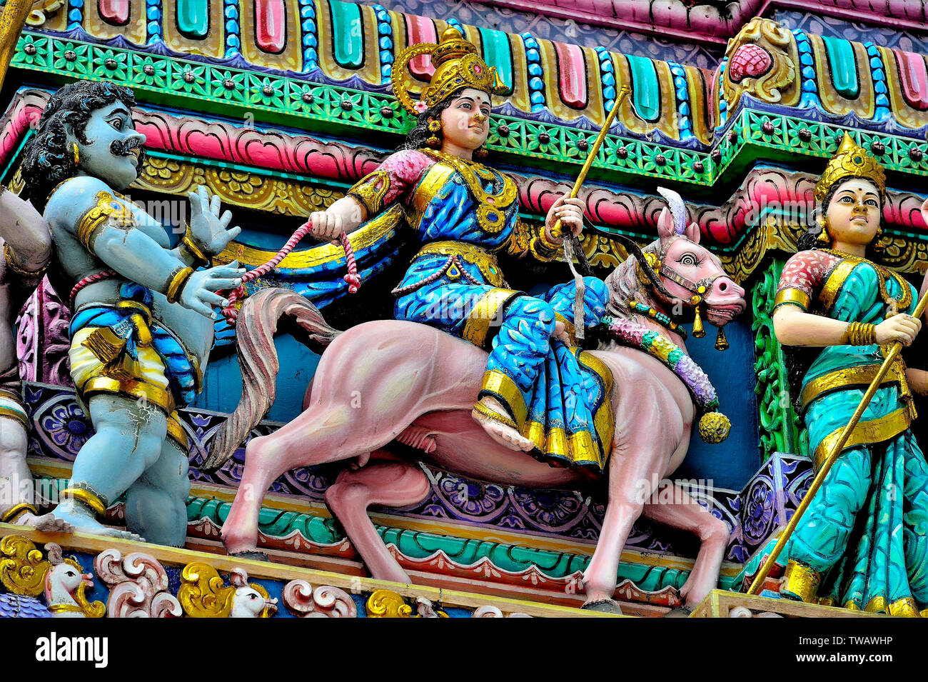 Colourful statues of Hindu religious deities adorning the entrance of ...