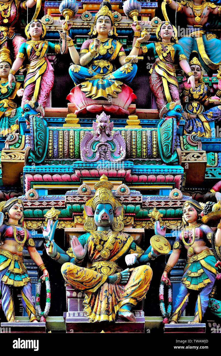 Colourful statues of Hindu religious deities adorning the entrance of ...