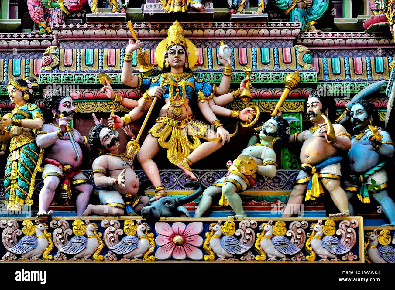 Colourful statues of Hindu religious deities adorning the entrance of ...