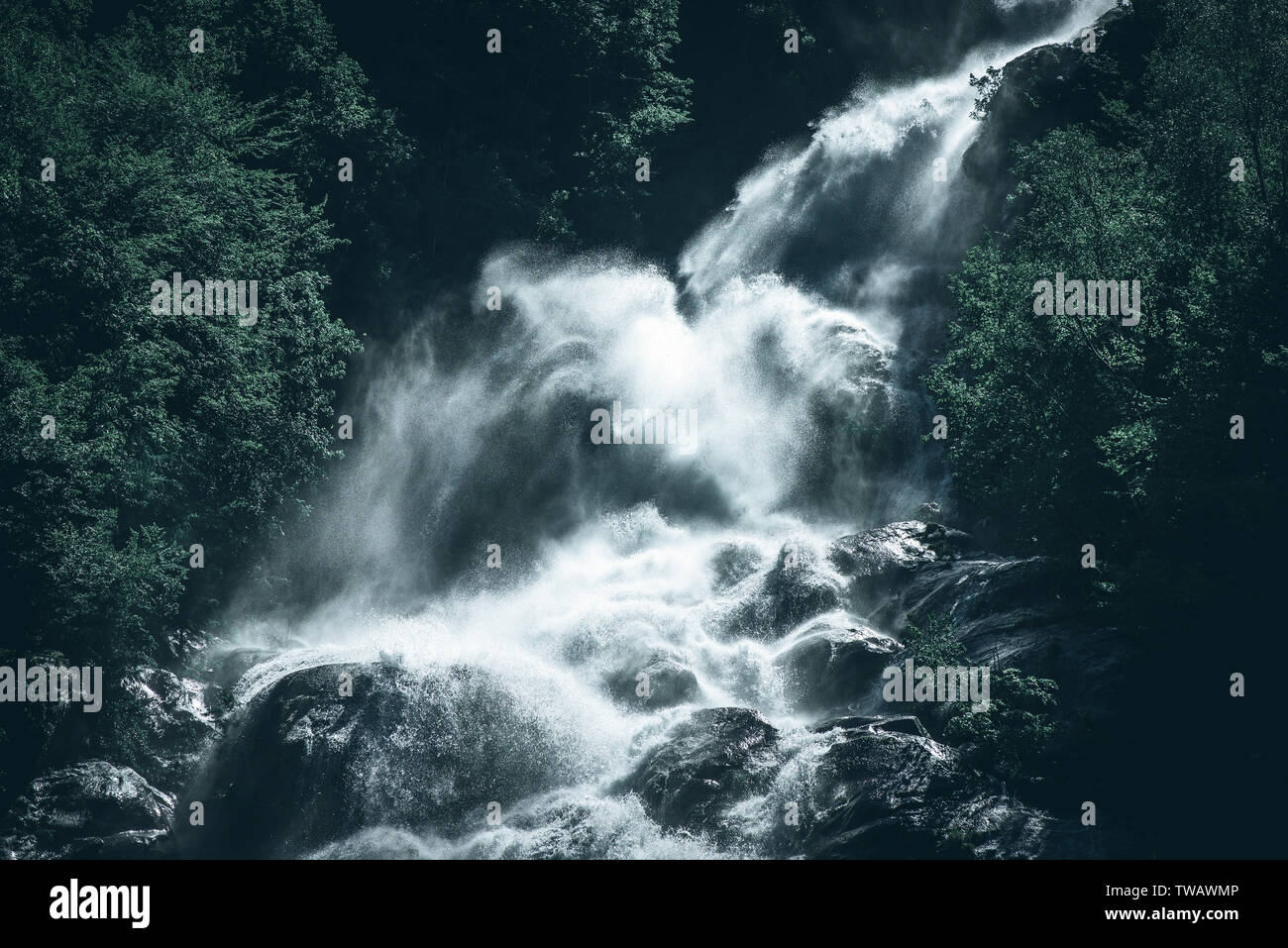 power of a waterfall water - dark mood style image Stock Photo - Alamy