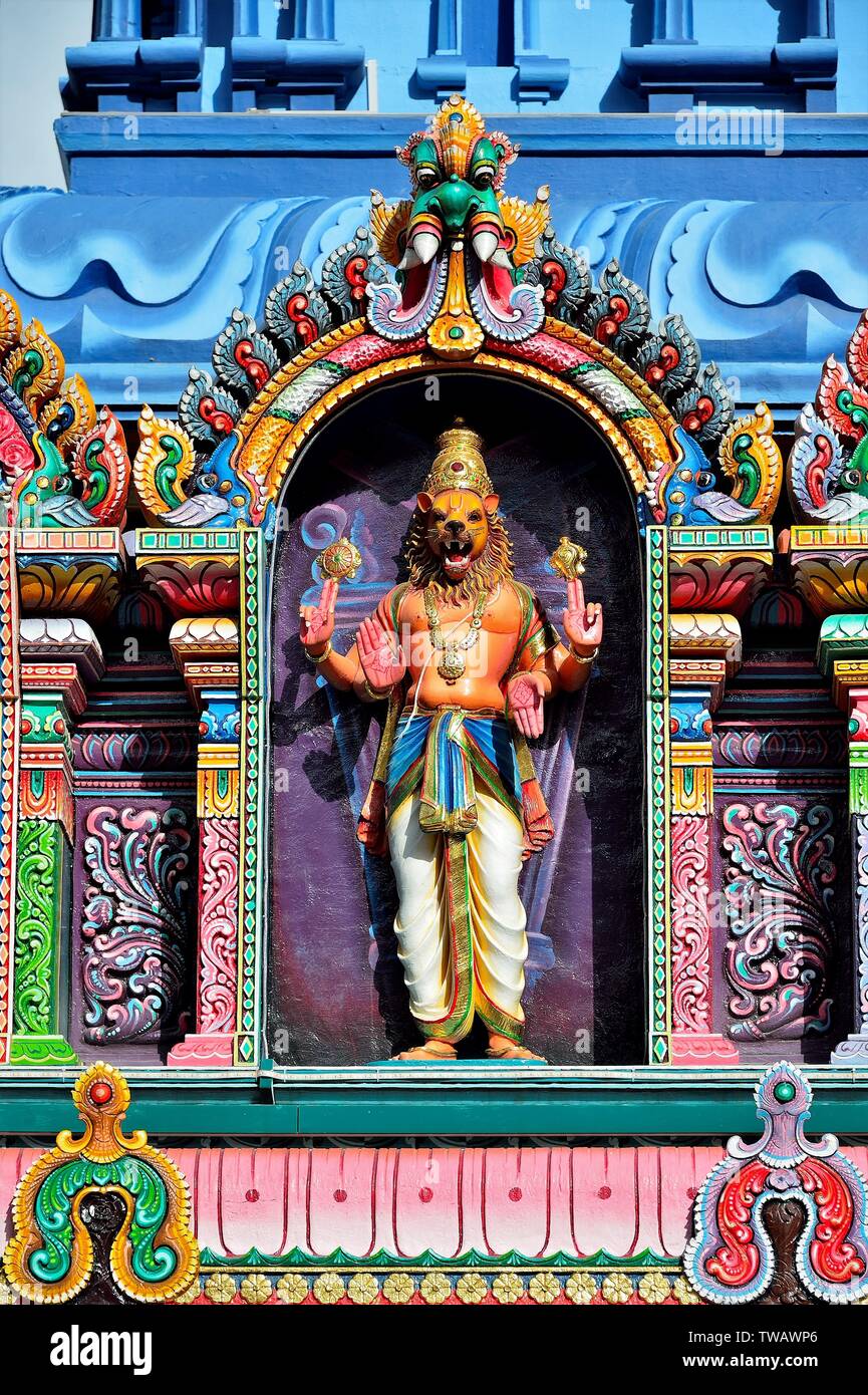 Colourful statues of Hindu religious deities adorning the entrance of ...