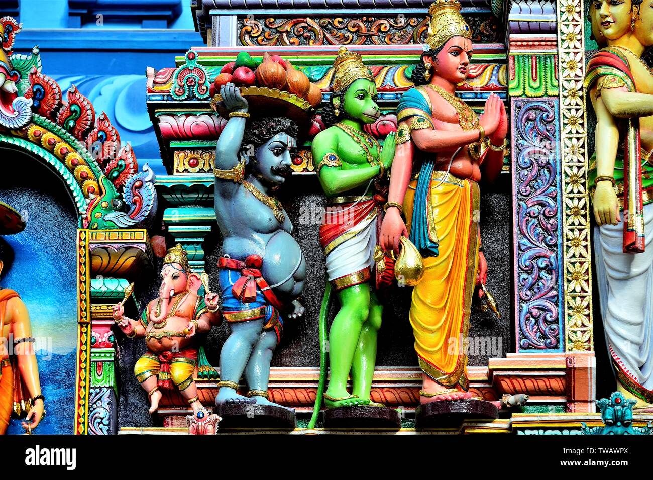 Colourful statues of Hindu religious deities adorning the entrance of ...