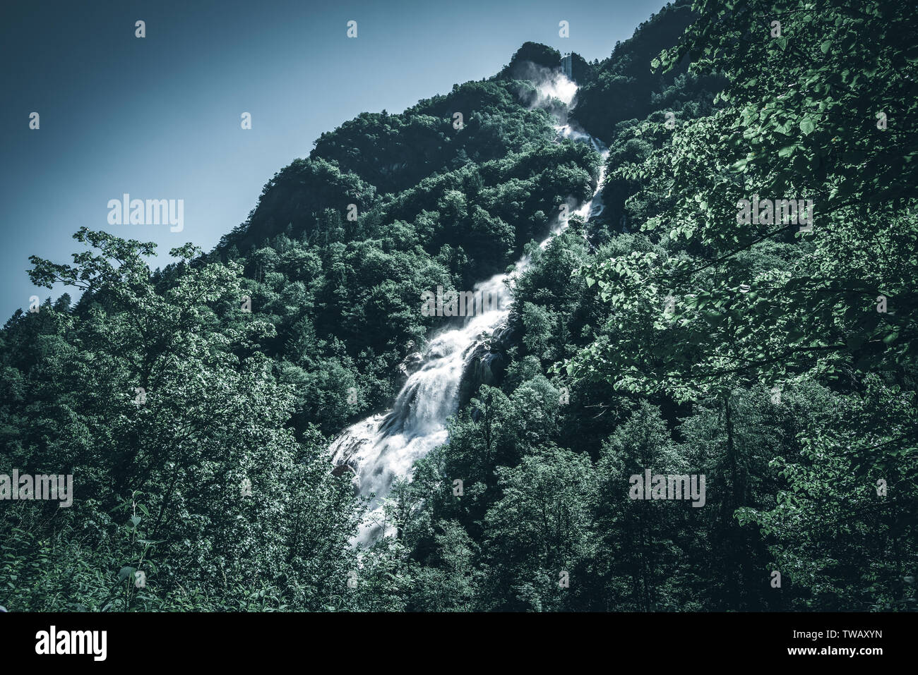 power of a waterfall water - dark mood style image Stock Photo - Alamy