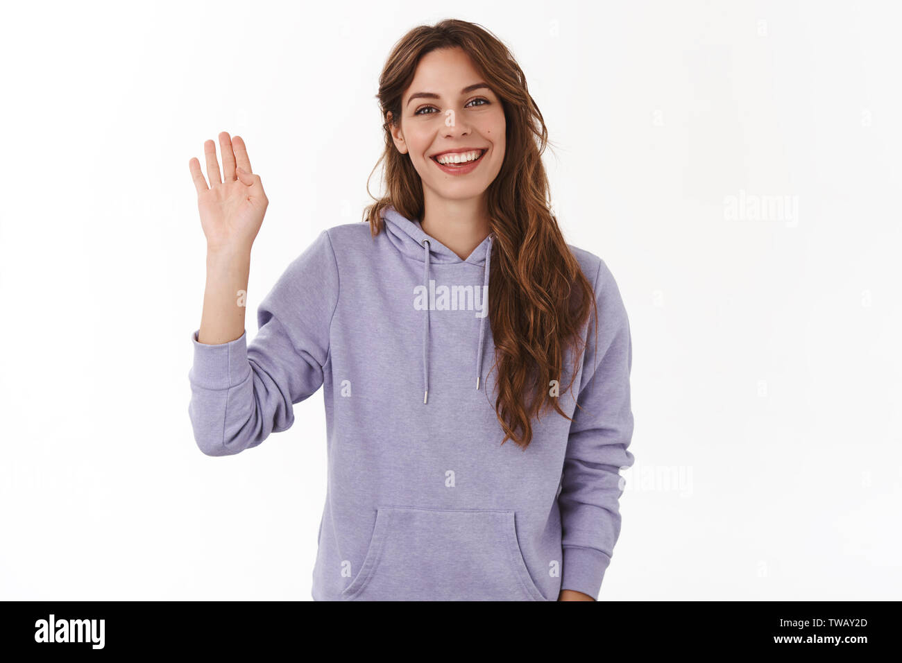 Hello internet. Cheerful charismatic attractive friendly girl waving ...