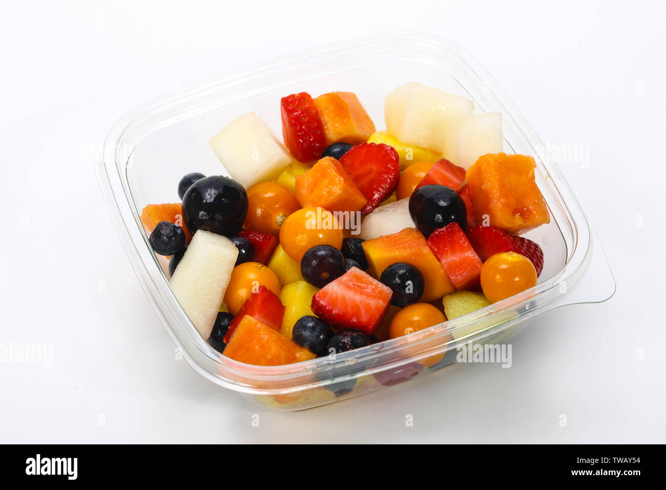 Sliced tropical fruit mix snack in the box Stock Photo - Alamy