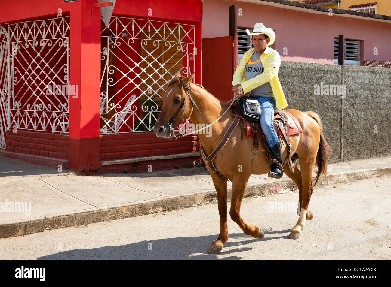 Cuban cowboy riding horse in street hi-res stock photography and images ...