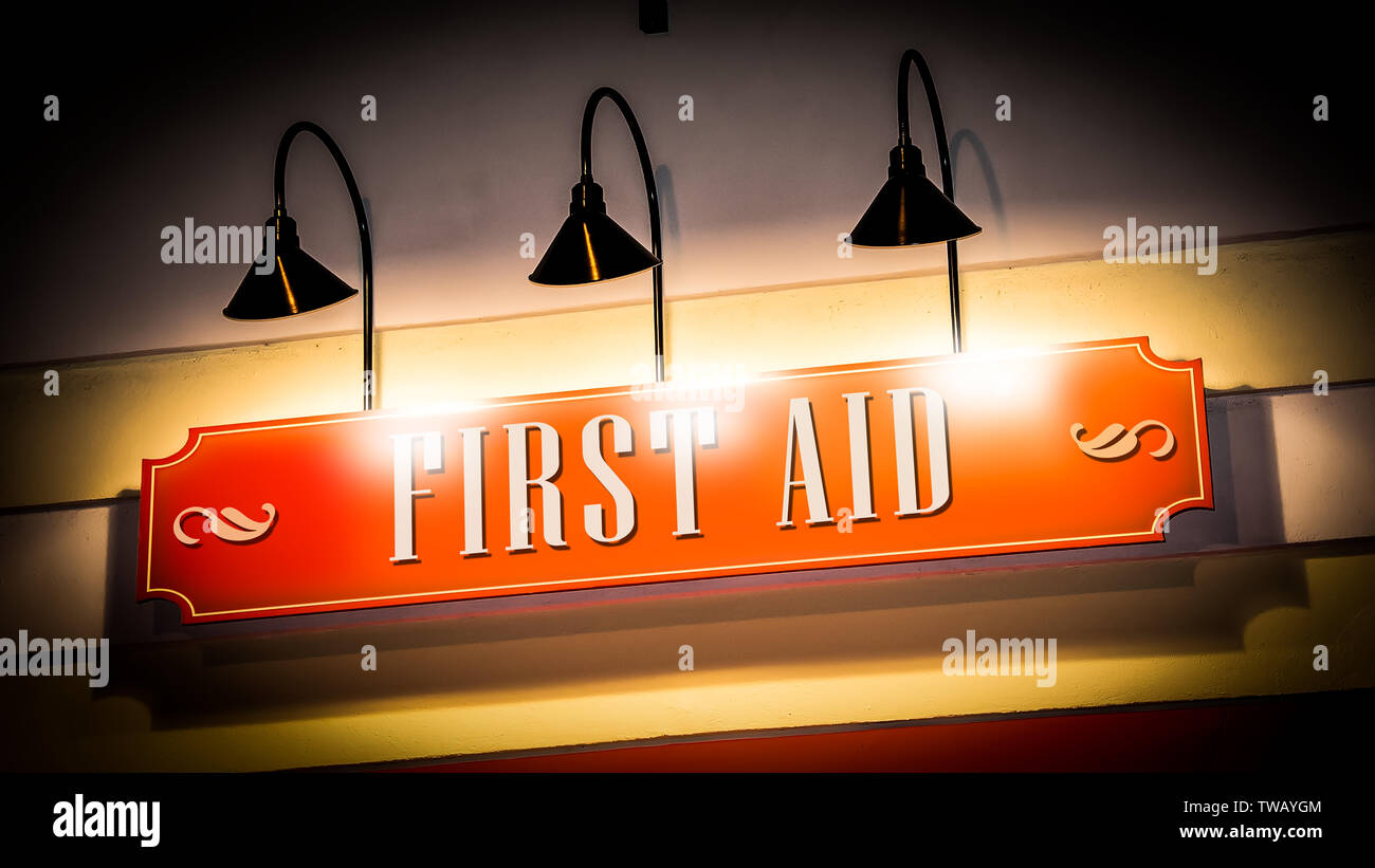 Street Sign the Direction Way to First Aid Stock Photo - Alamy