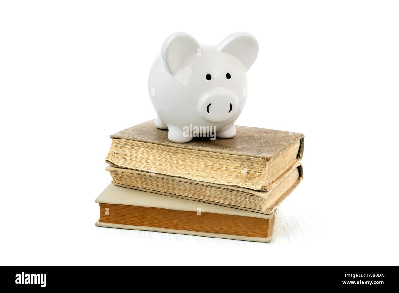 Piggy bank books savings hi-res stock photography and images - Alamy