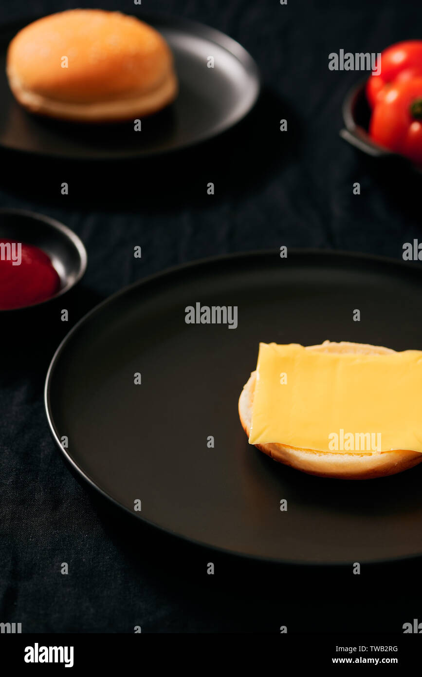 Process making of burger, step by step isolated on black background ...