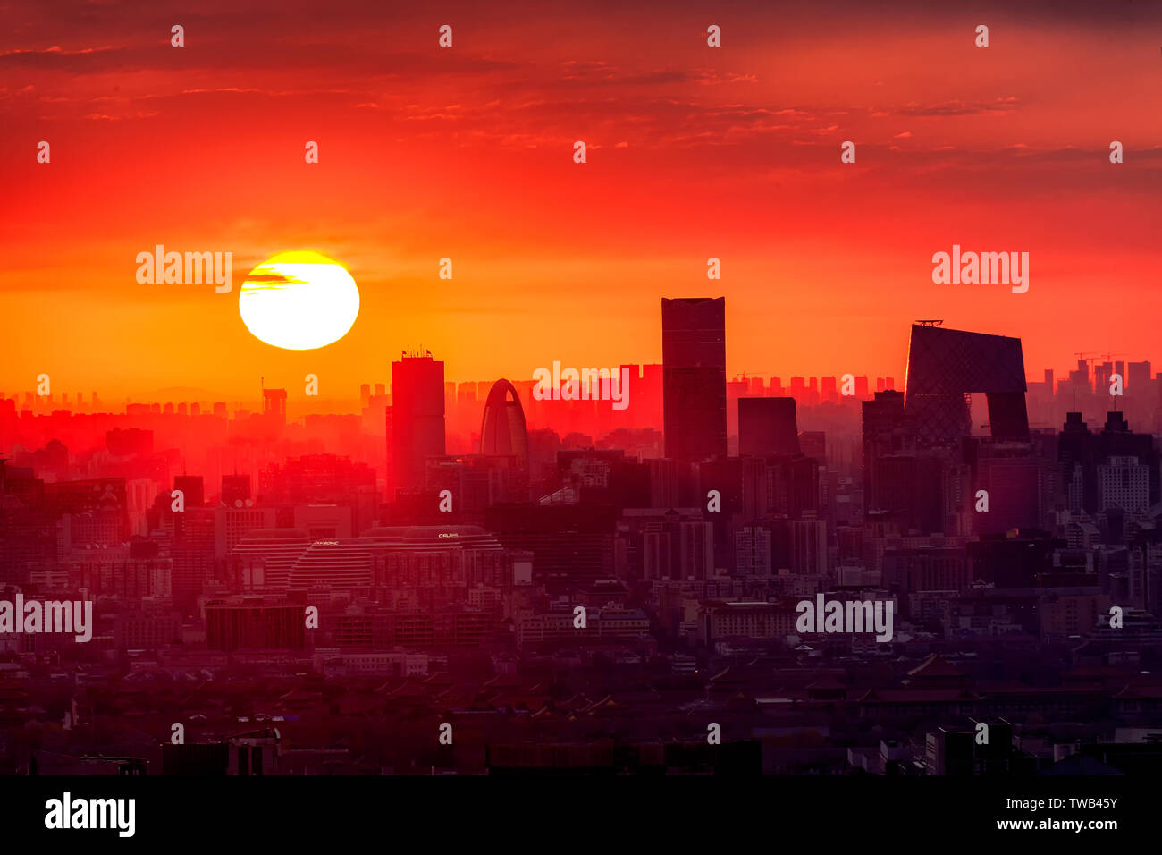 The CBD and the Forbidden City under the first red sun, ancient and ...