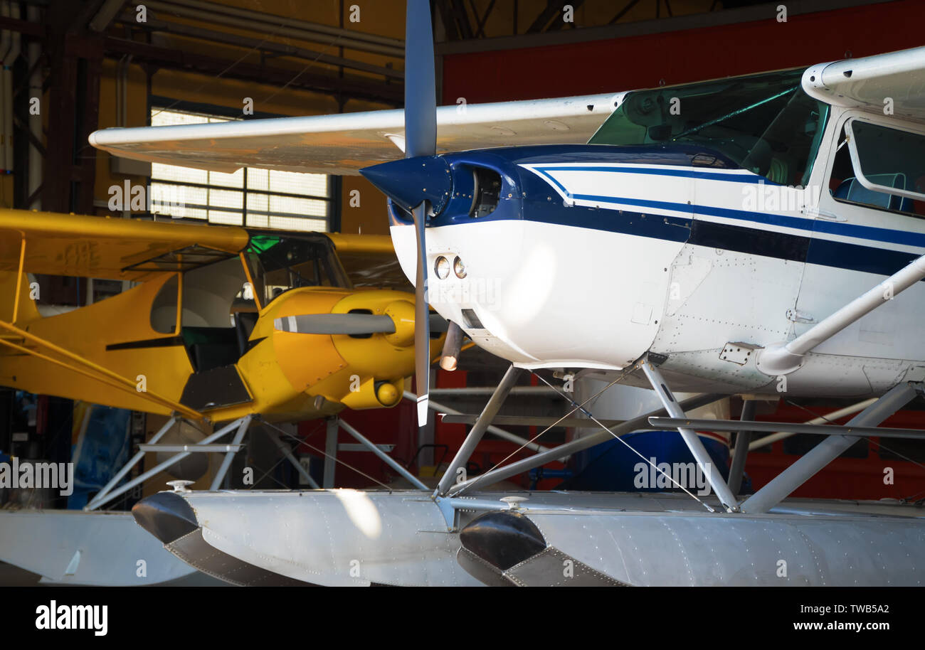 Close-up view of floatplanes (seaplanes) standing in hangar Stock Photo ...