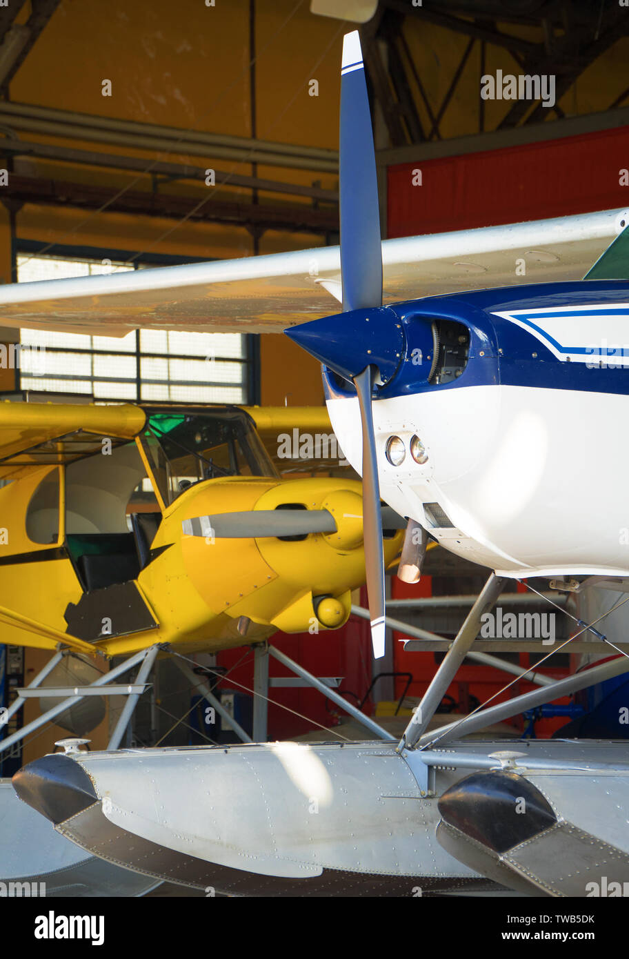 Close-up view of floatplanes (seaplanes) standing in hangar Stock Photo ...