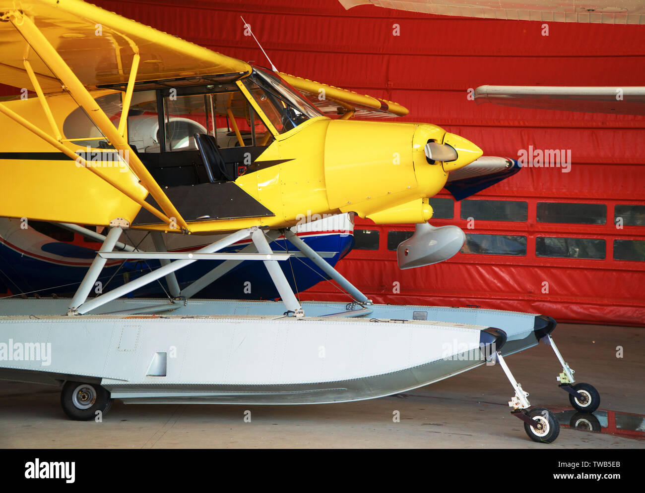Close-up view of floatplanes (seaplanes) standing in hangar Stock Photo ...