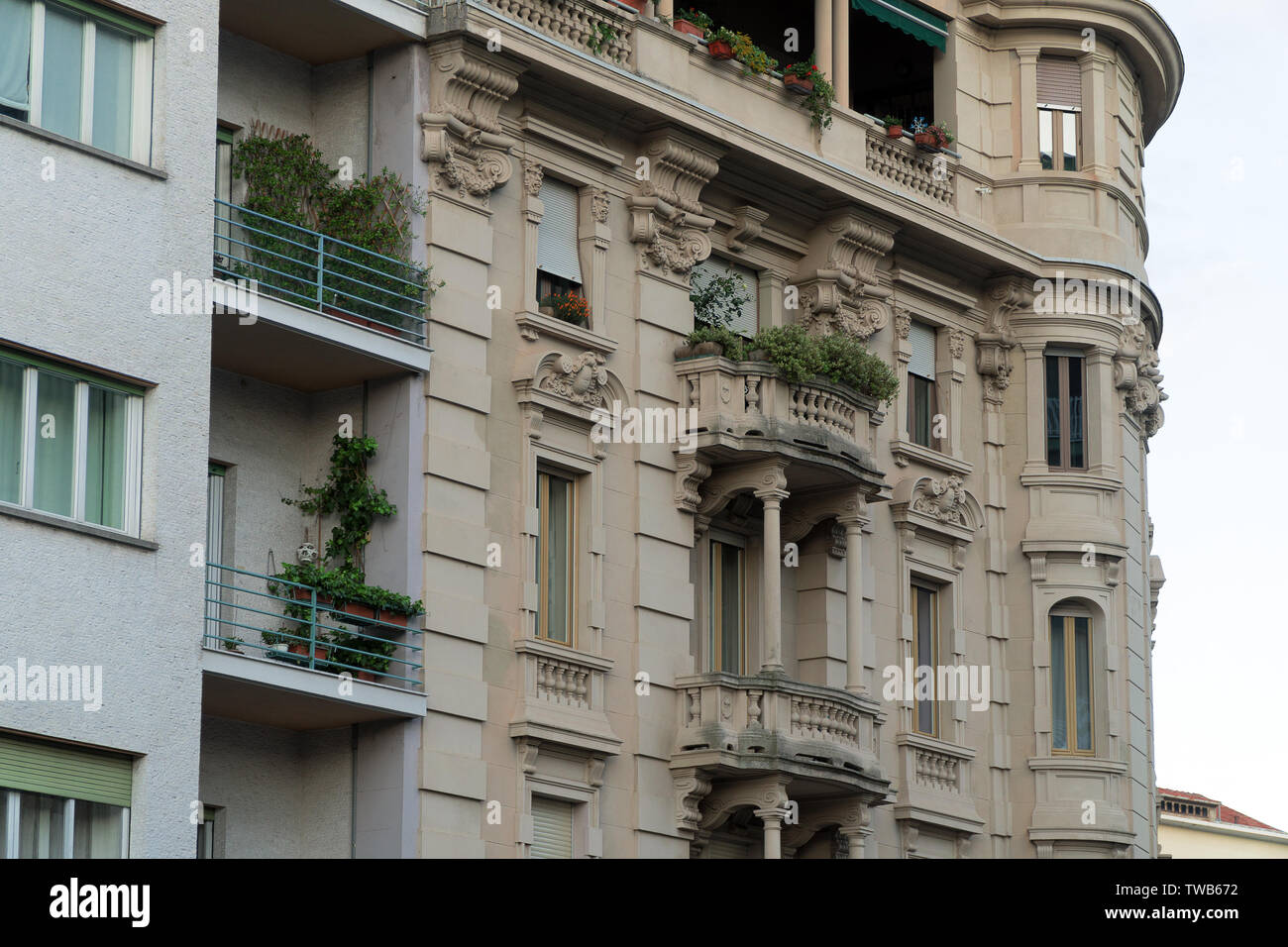 Facade of new retro style apartment building Stock Photo - Alamy