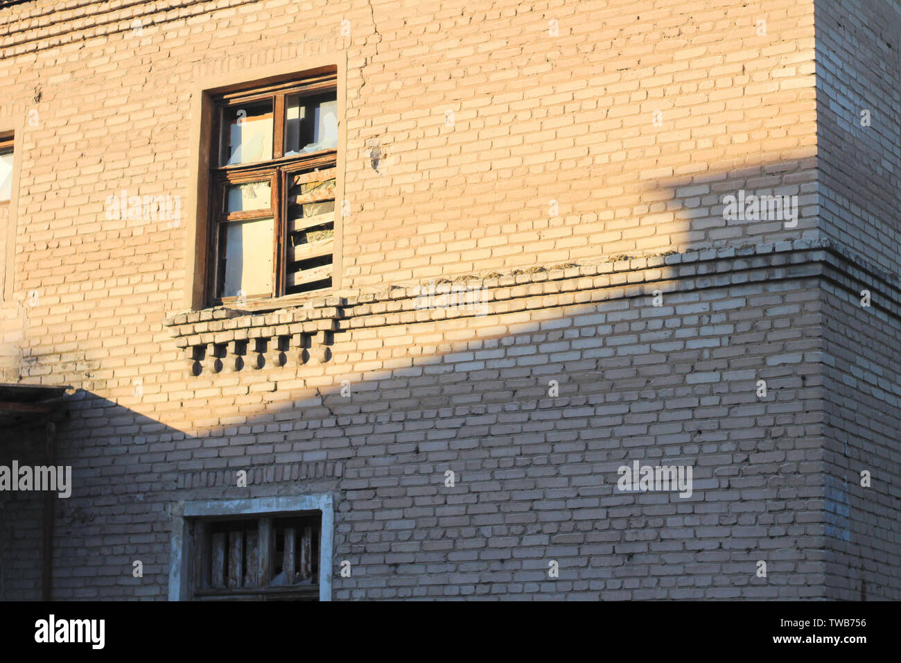 smashed a shot of an old brick building window at the Donbass in ...