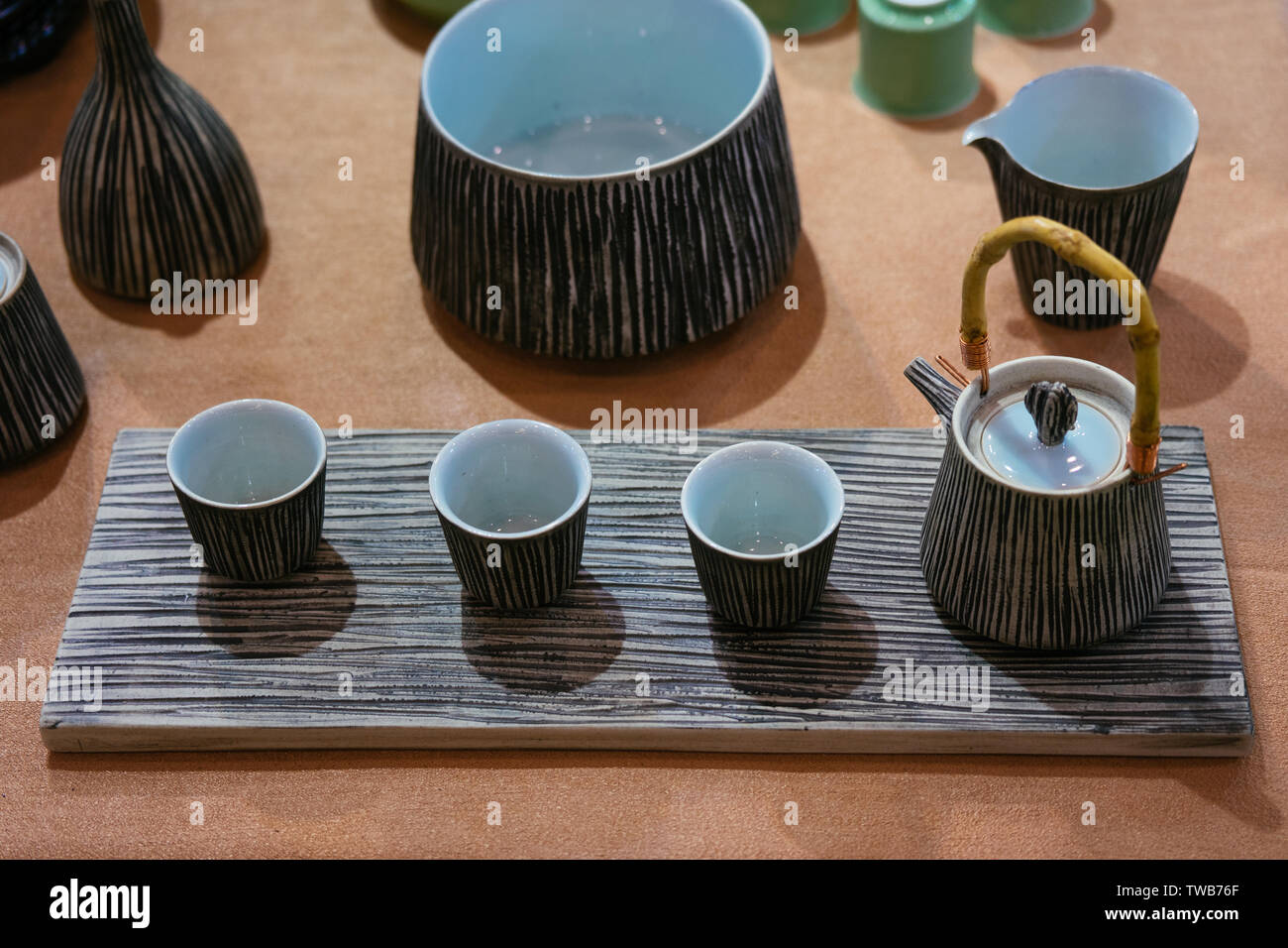 Exquisite coarse pottery tea set Stock Photo - Alamy