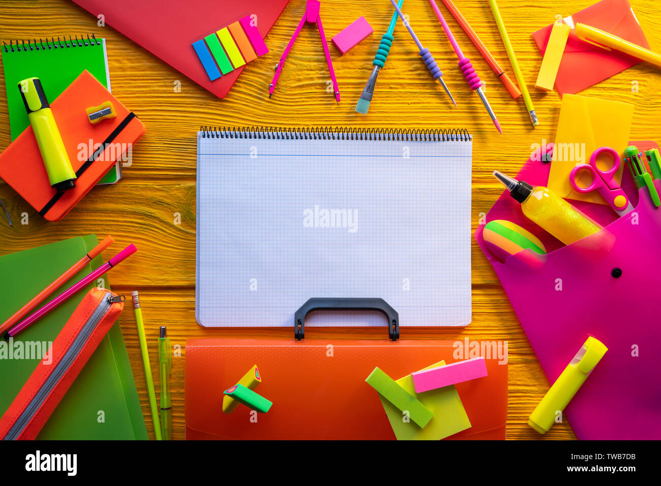 Back to school supplies arrangement vivid colorful neon color in yellow ...