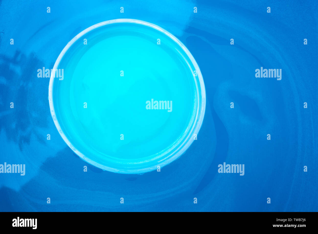 Abstract blue and turquoise water container background buckets Stock ...