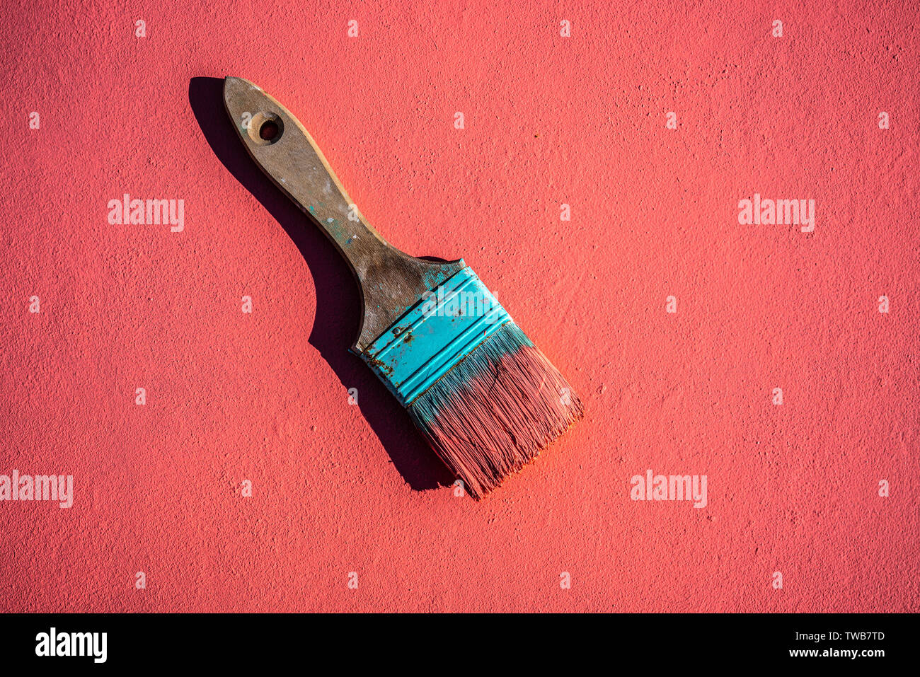 Coral color grunge brush with paint in monochromatic coral background ...