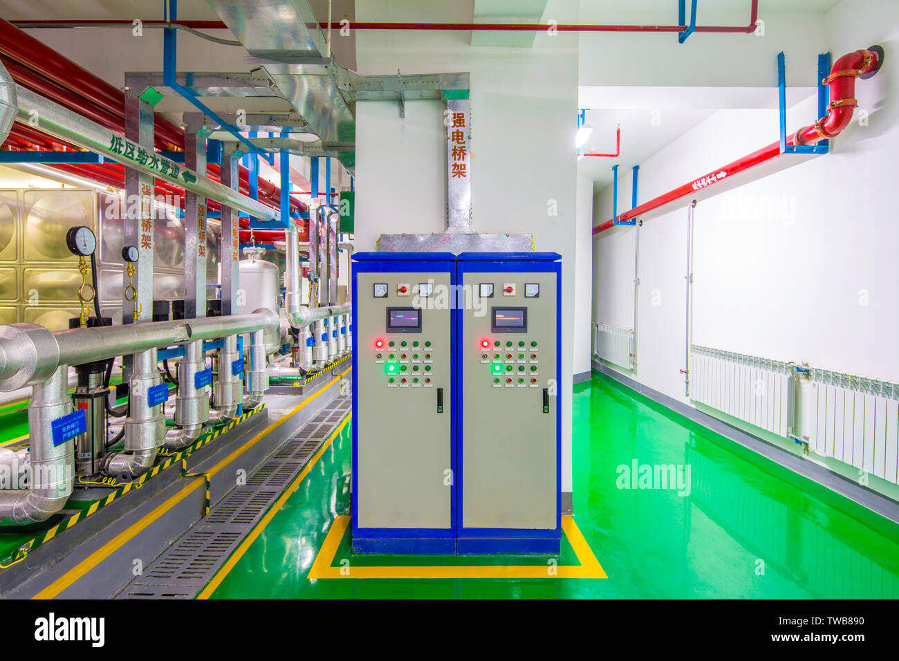 Pressurized water pump room Stock Photo - Alamy