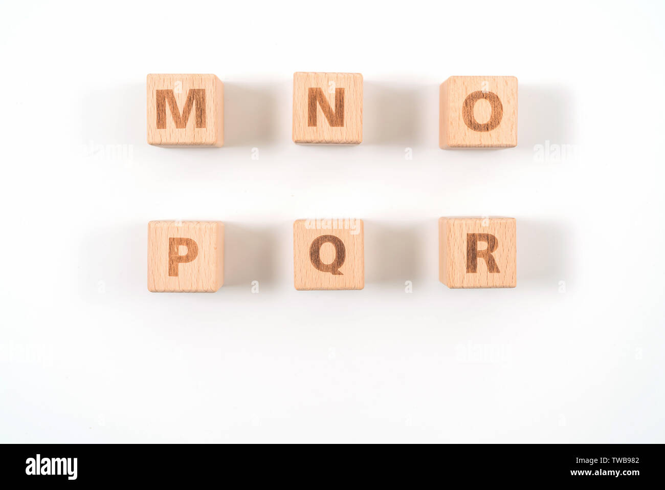 Alphabet on wood ,white background Stock Photo - Alamy