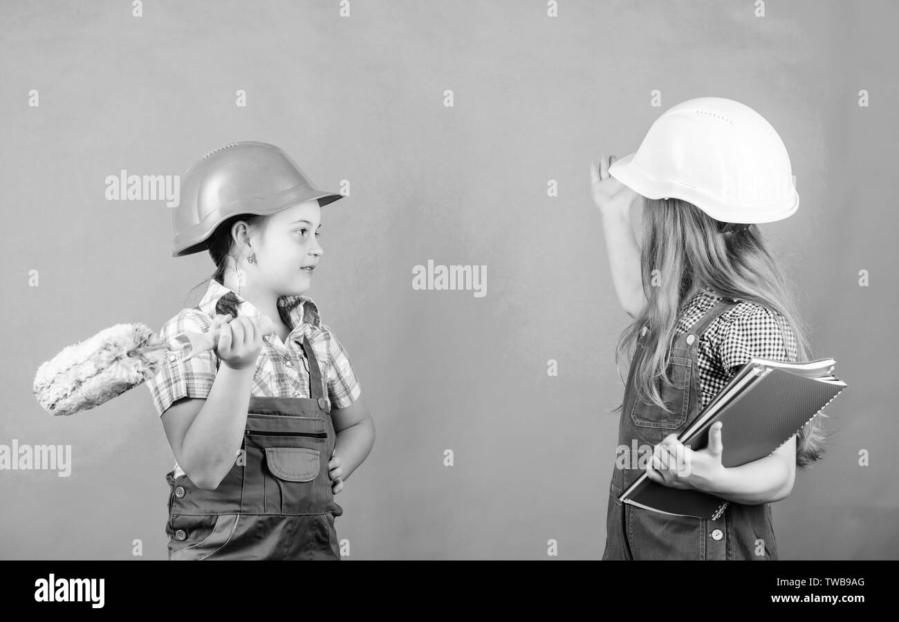 Little kids in helmet with tablet and roller. Labor day. 1 may. school ...