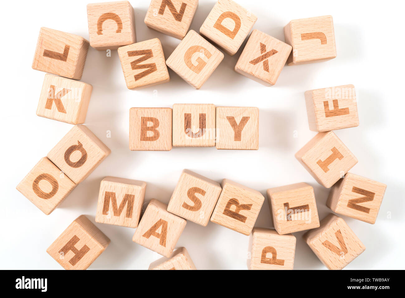"BUY" wooden blocks of business concept isolated on white background ...