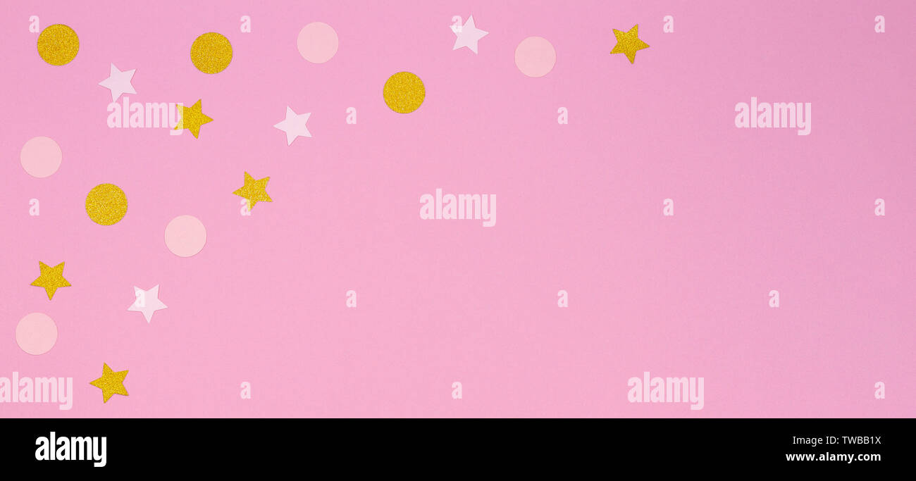Festive pink background. Colorful confetti and golden stars on light ...