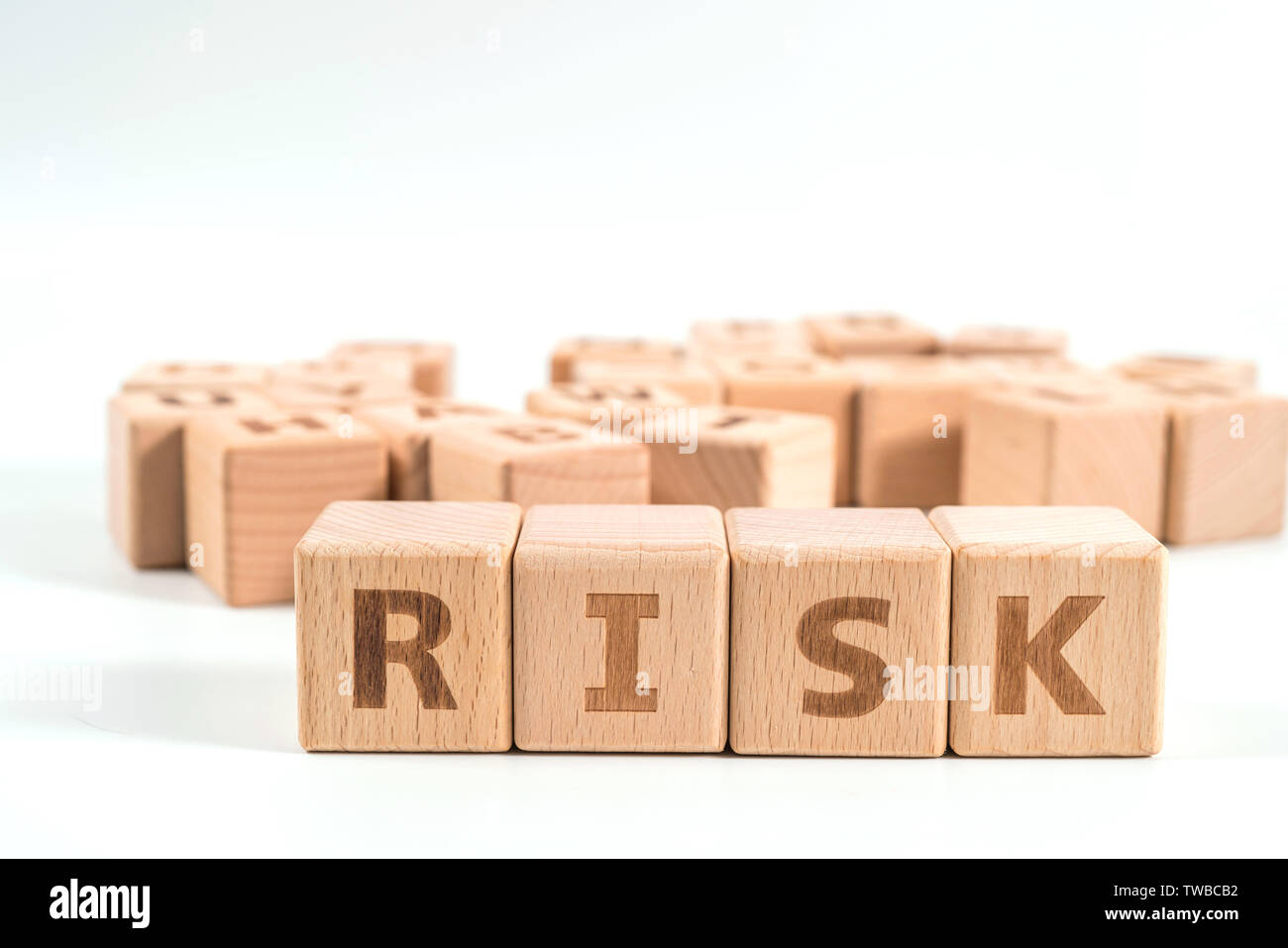 RISK wooden blocks of business concept isolated on white background ...