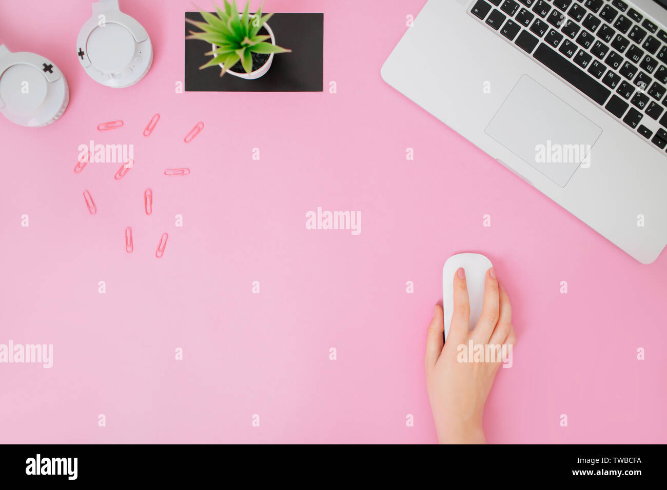 Stylized flatlay with women's office desk. Workspace with laptop ...