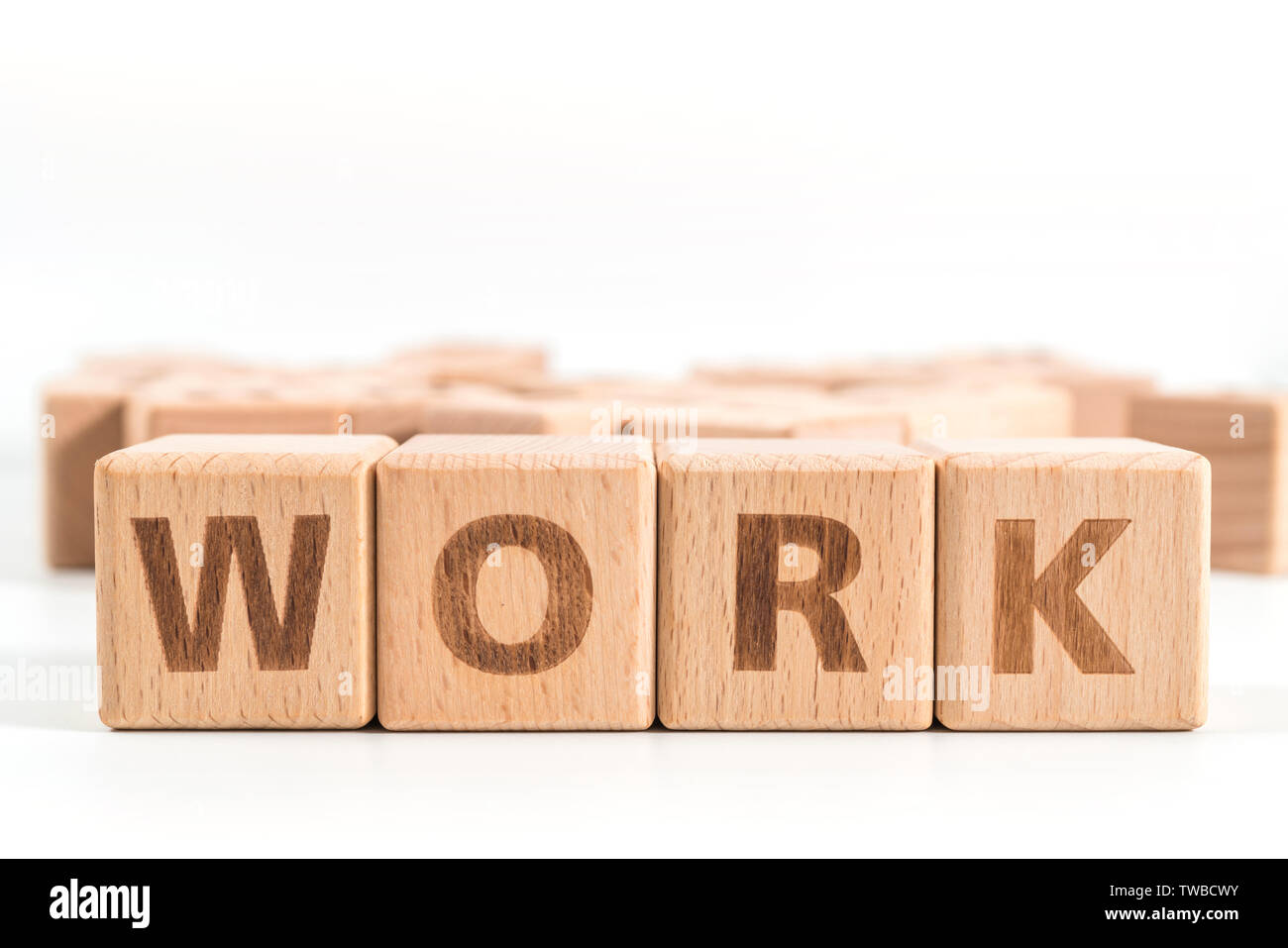Work wooden blocks of business concept isolated on white background ...